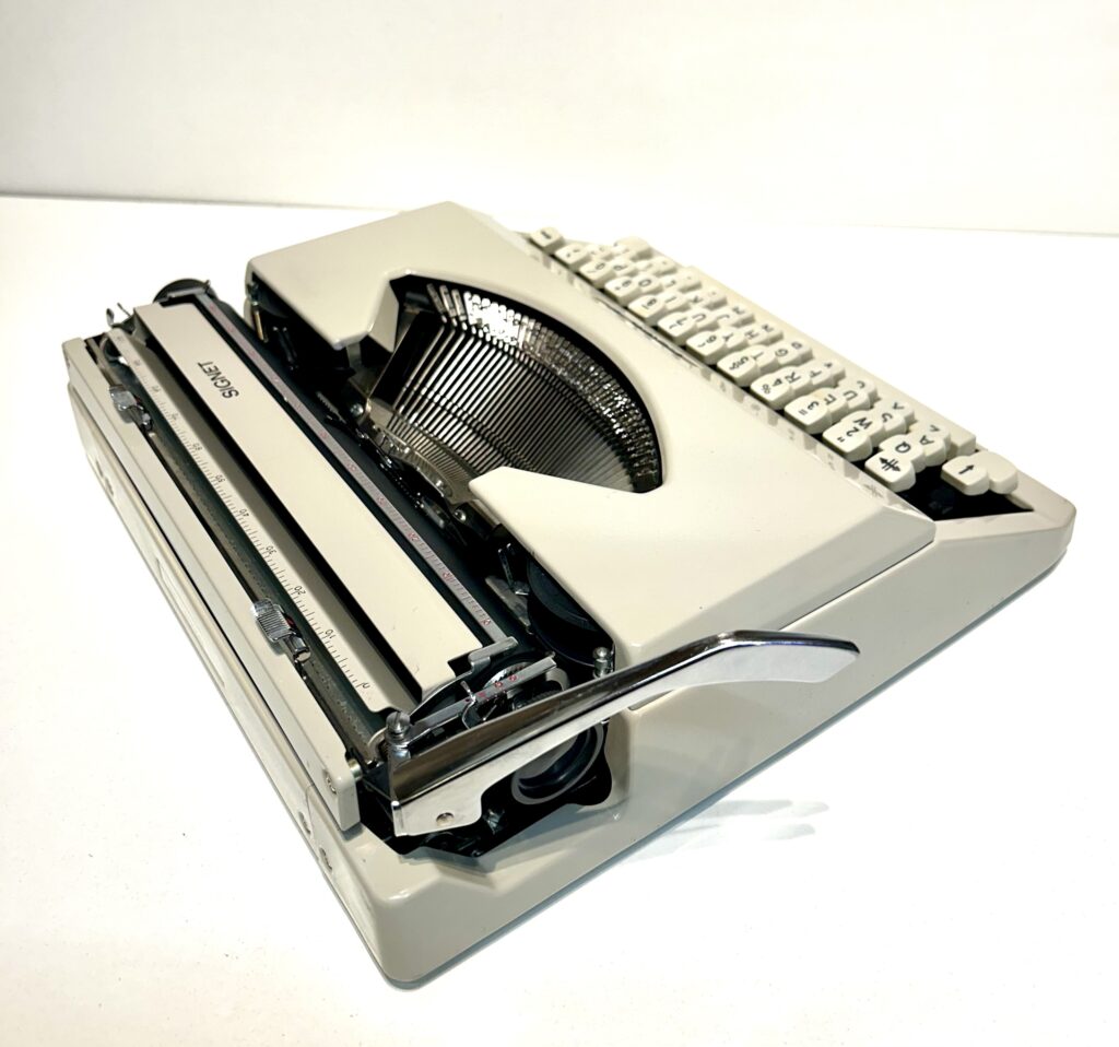Grijze vintage werkende typemachine Royal Signet grijs portable uit ...